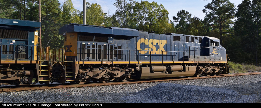 CSX 920 ES44AH CSX 7919 X-LMSX 701 C40-8W bring a manifest south through CSX Wyvern Yard in ...